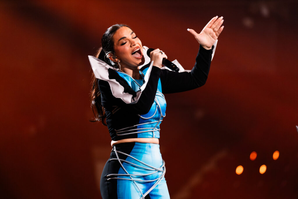 Malmö messages: a bunch of dancers and a singer dressed in fur ...